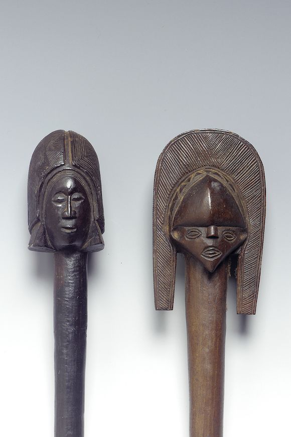 Bonhams : An Ovimbundu wood janus face staff 56cm.