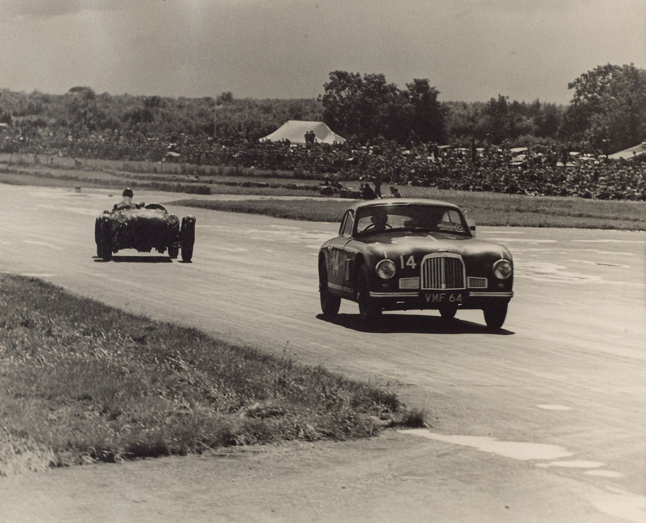 Bonhams Cars : A monochrome photoprint of George Abecassis in the Aston ...