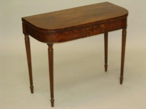 Bonhams : A Regency mahogany D-shaped card table,