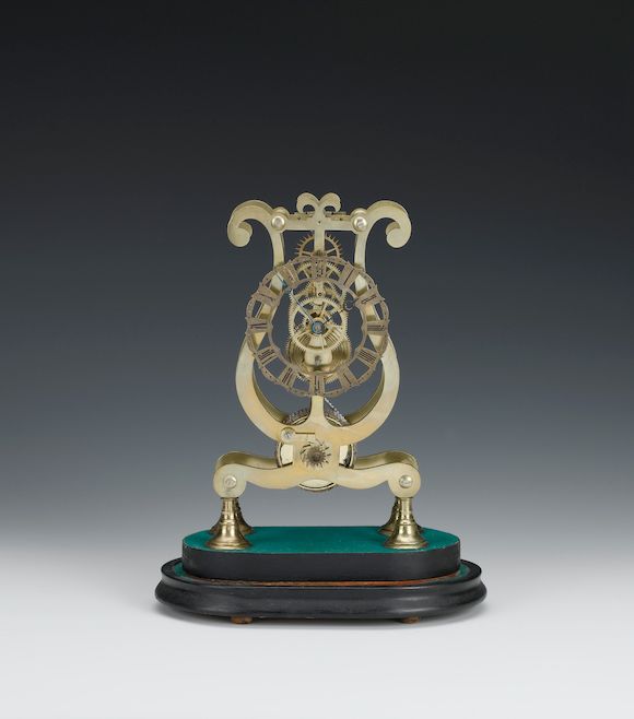 Bonhams : A 19th century brass skeleton timepiece with deadbeat escapement