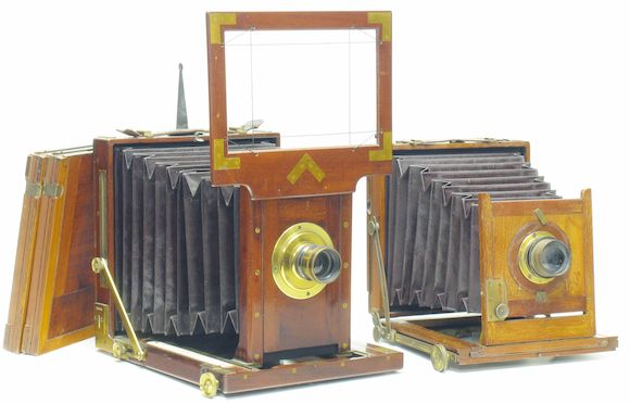 Bonhams : Field camera G. Hare London half plate mahogany and brass ...