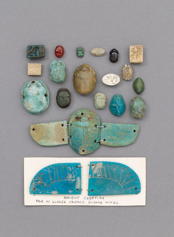 Bonhams : Seventeen Egyptian scarabs and scaraboids, a pair of wings, a ...