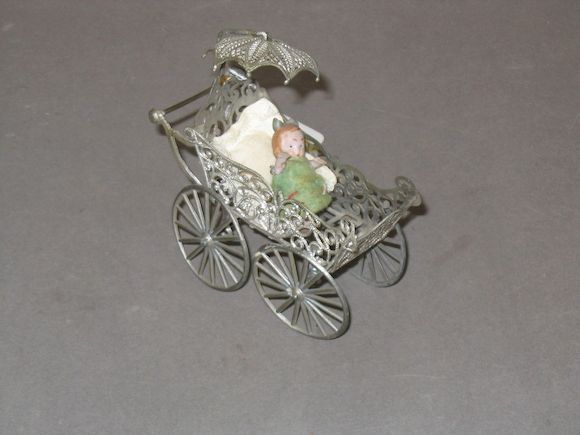 Bonhams : Miniature pewter dolls pram, German circa 1900