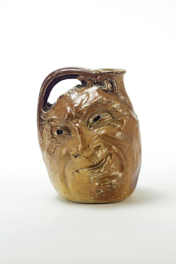 Bonhams : Martin Brothers A Stoneware Grotesque Double-Sided Face Jug, 1901