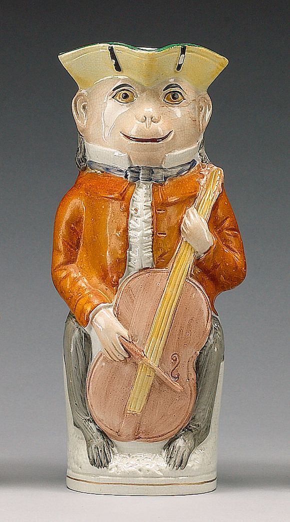 Bonhams : A monkey musician Toby Jug, circa 1870,