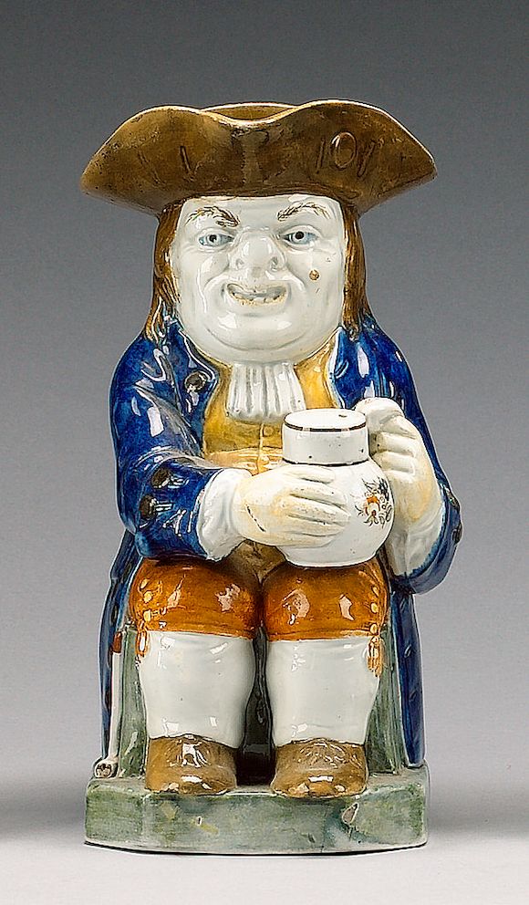 Bonhams : A Pratt Ware Toby Jug and a cover, circa 1810-20,