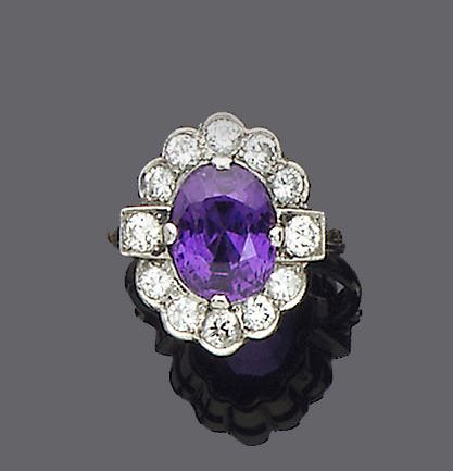 Bonhams : A synthetic colour-change corundum and diamond cluster ring