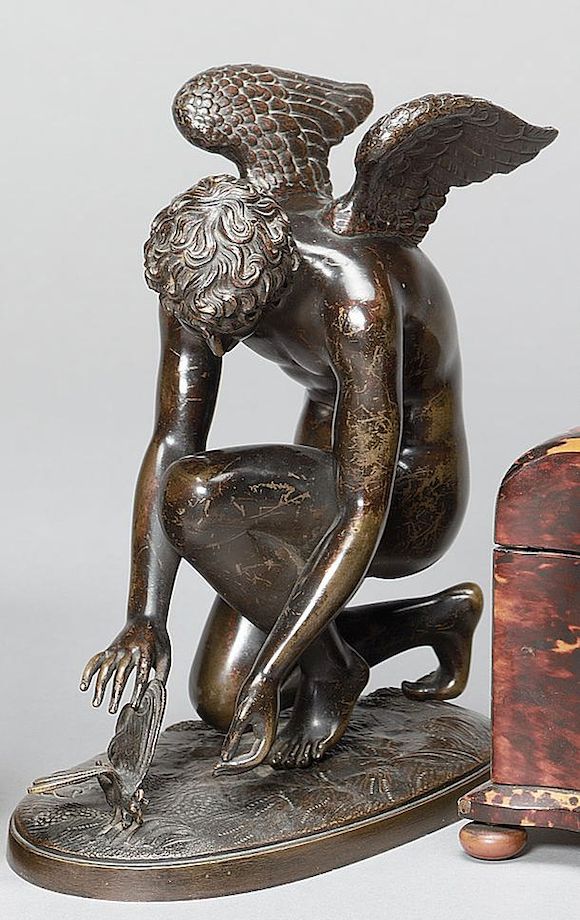 Bonhams : An early 19th century French bronze Figure of a seated winged ...