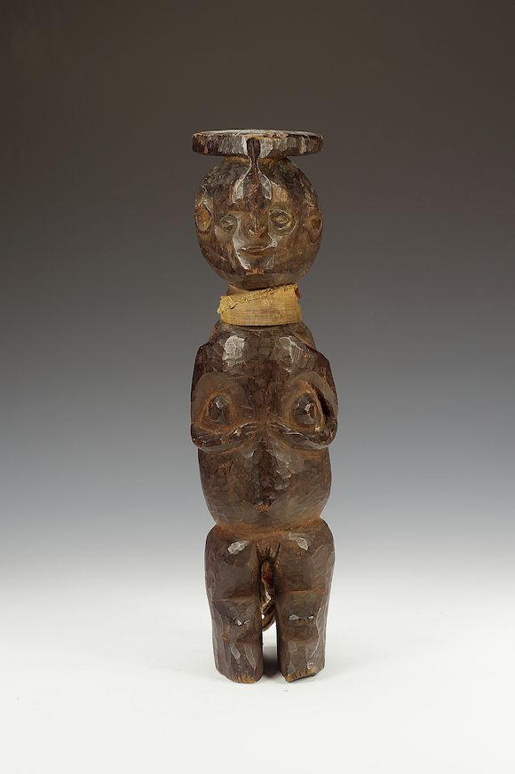 Bonhams : A Pende wood female figure 42cm.