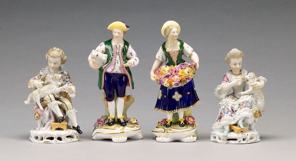 Bonhams : A pair of Sitzendorf models of children with sheep, and a ...