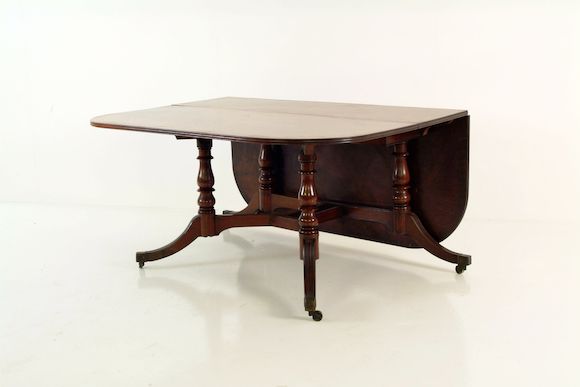 Bonhams : A Regency mahogany drop flap dining table