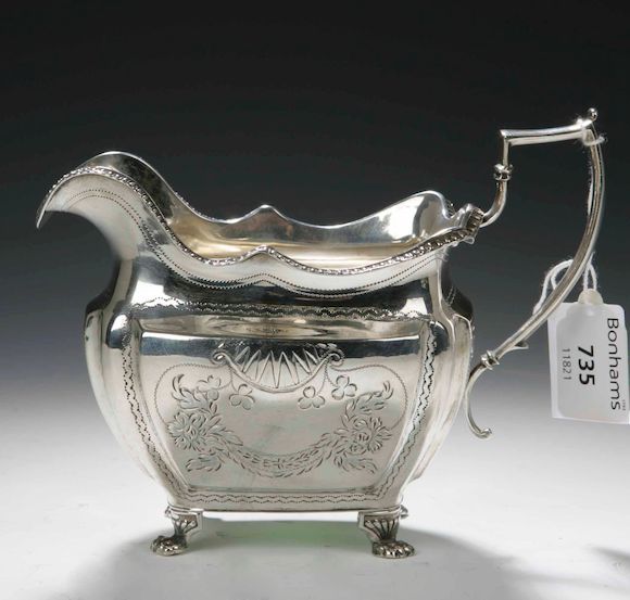 Bonhams : A George III Irish cream jug, by Richard Sawyer, Dublin, 1814,