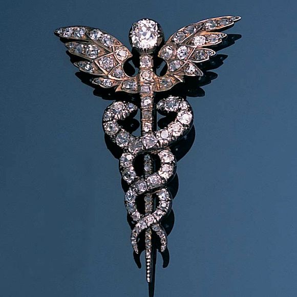 Bonhams : A late 19th century diamond caduceus brooch,