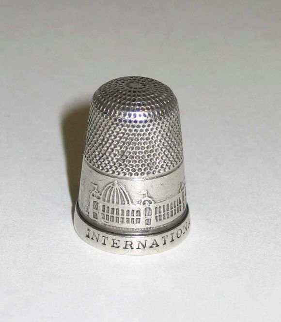 Bonhams : A silver commemorative thimble,