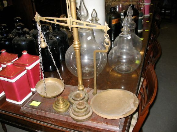 Bonhams : A set of brass two arm balance scales,