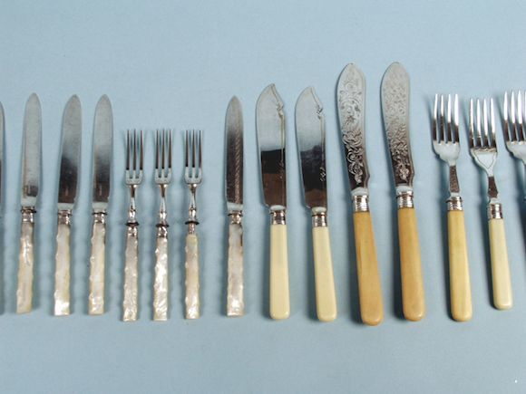 Bonhams : A mixed set of bone handled fish knives and forks for eight