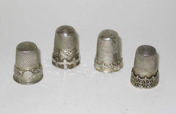 Bonhams : Four late 19th century German silver thimbles