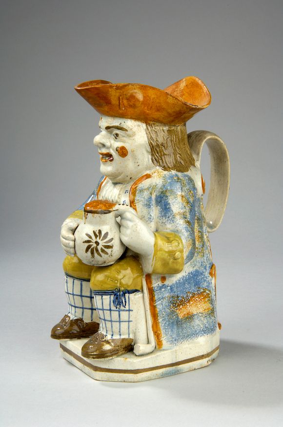 Bonhams : A Pratt Ware Toby jug,