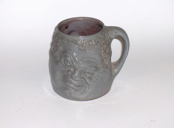 Bonhams : Martin Brothers A Stoneware Grotesque Double-Sided Tankard ...