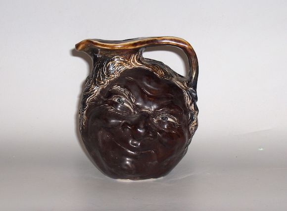 Bonhams : Martin Brothers A Stoneware Grotesque Double-Sided Face Jug ...