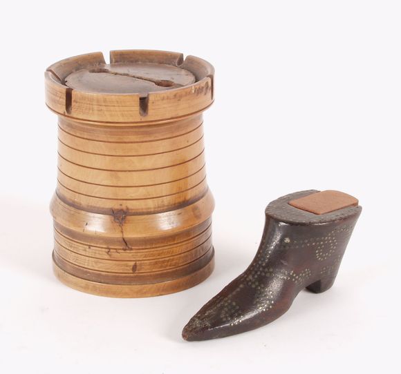 Bonhams : A treen money box in the form of a tower 7.5cm high. (2)