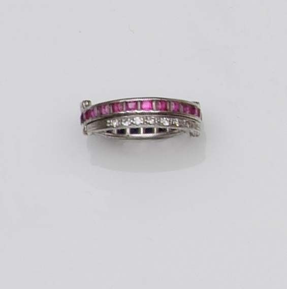 Bonhams : A diamond, ruby and sapphire swivel hoop eternity ring