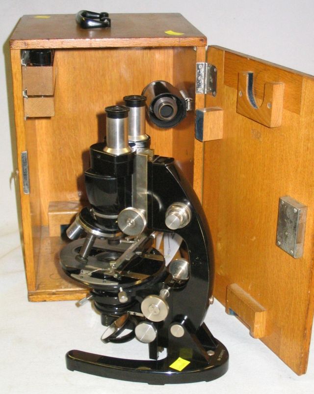 A 1930's binocular microscope by Cooke A - auctions & price archive