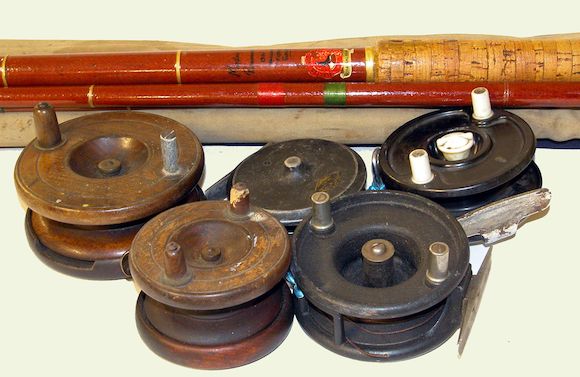 Bonhams : A Milwards Swimversa three piece cane rod 12ft