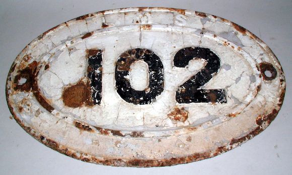 Bonhams : LMS oval cast iron bridge plate No. 102 (LNWR pattern)