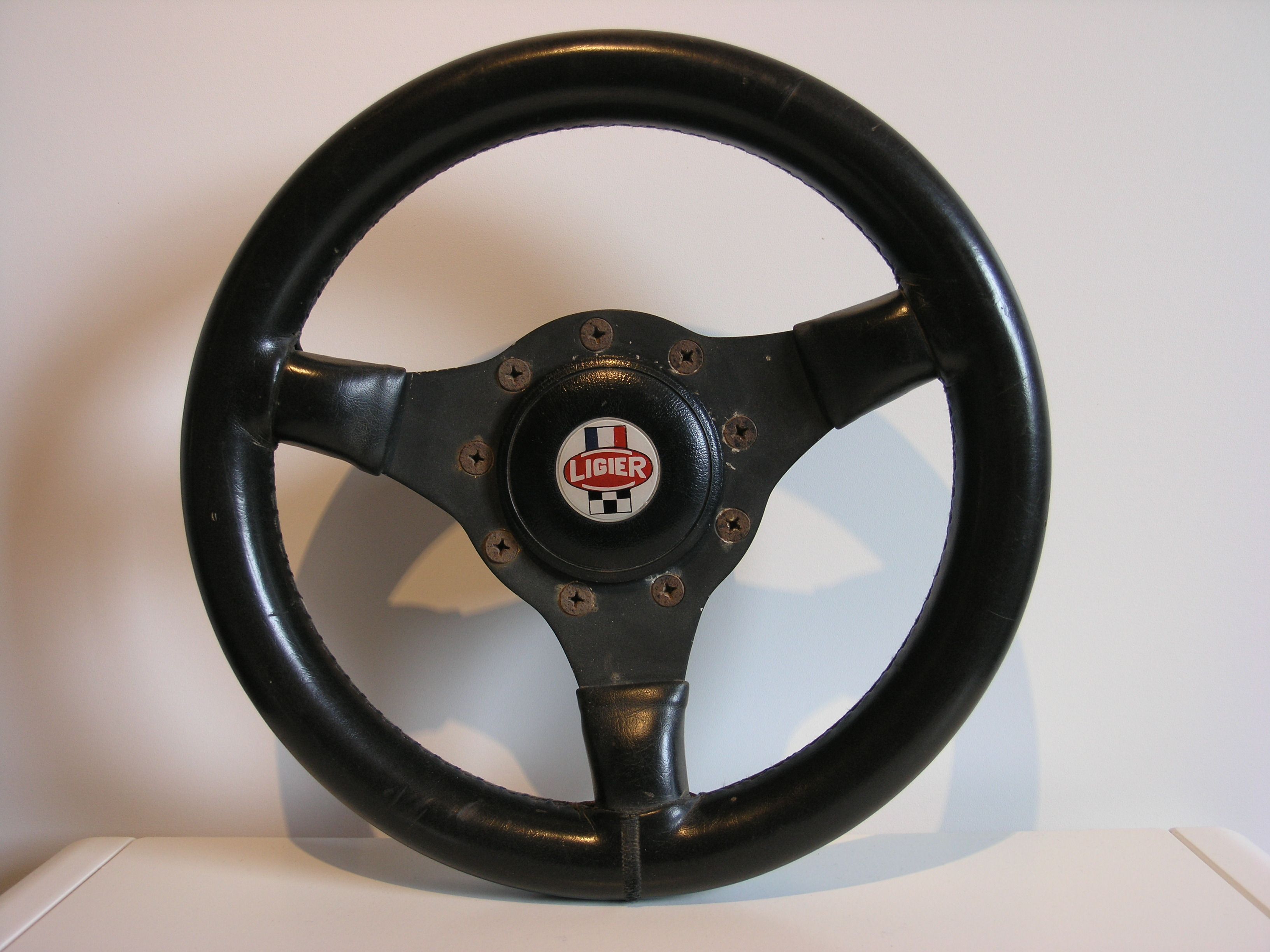 Bonhams Cars : An original race used Ligier steering wheel, 1970s,