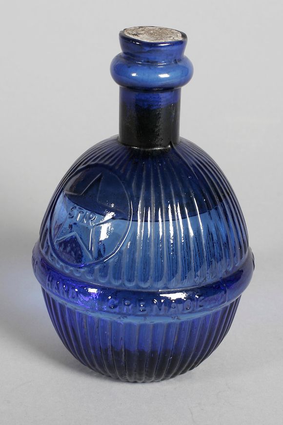 Bonhams : A blue glass Star fire grenade bottle