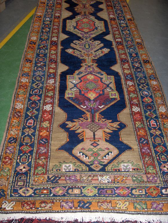 Bonhams : A Meshkin runner North West Persia, 311cm x 116cm