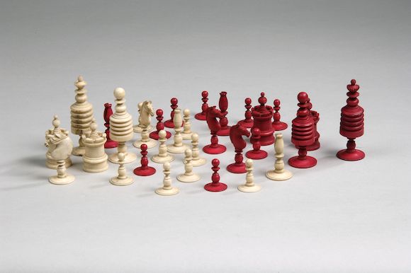 Bonhams : A 19th Century bone and red stained bone carved chess set