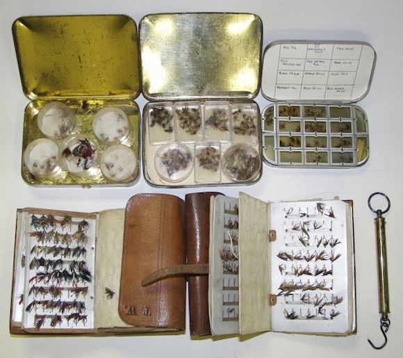 Bonhams : A pigskin fly wallet with parchment pages, felts and clip leaves
