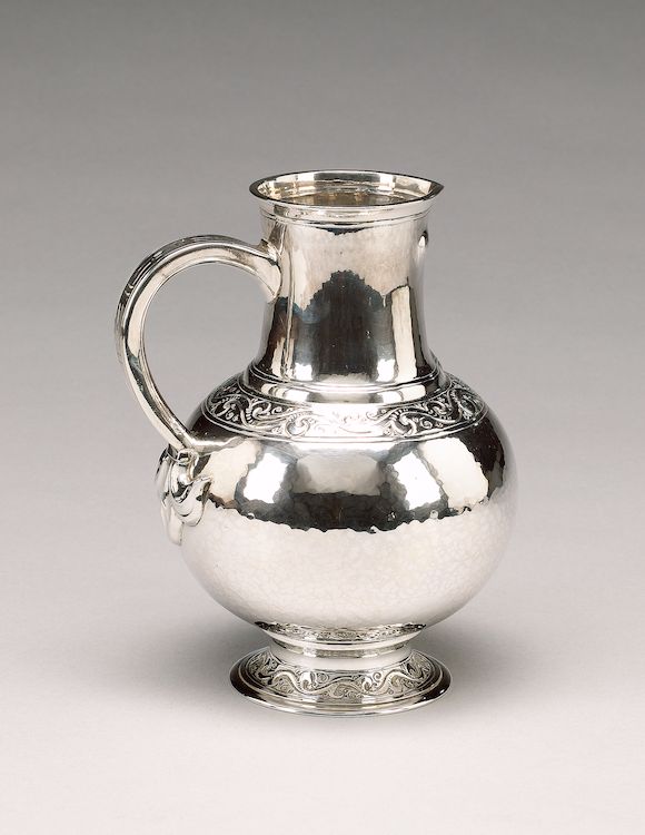 Bonhams : ROBERT EDGAR STONE : A silver spot hammered pitcher, in the ...