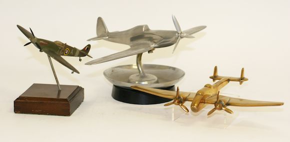 Bonhams : A white metal model of a war plane,