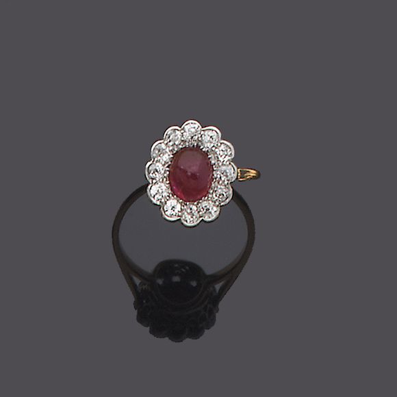 Bonhams : A ruby and diamond cluster ring