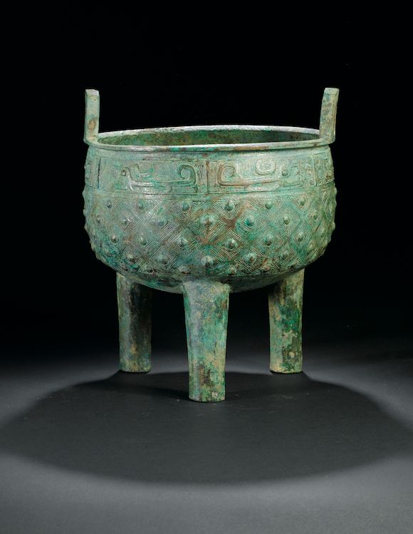 Bonhams : A very rare pair of archaic bronze tripod food vessels, ding ...