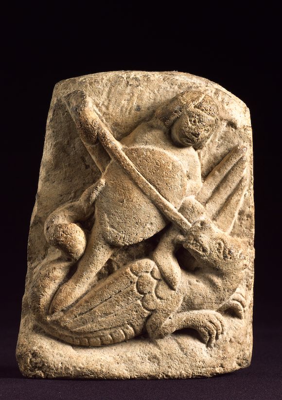 Bonhams : An English stone carving of St George and the Dragon