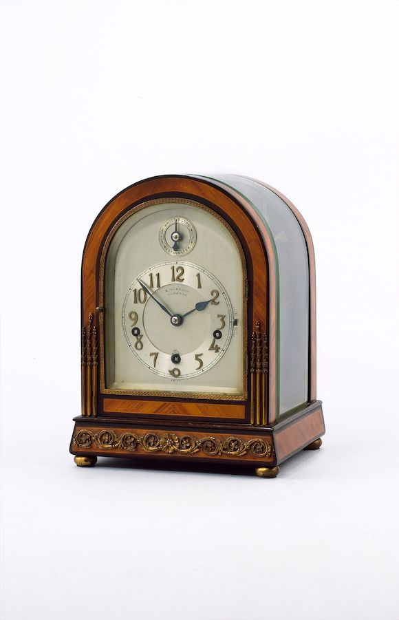Bonhams : An unusual quarter chiming satinwood mantel clock. Retailed ...