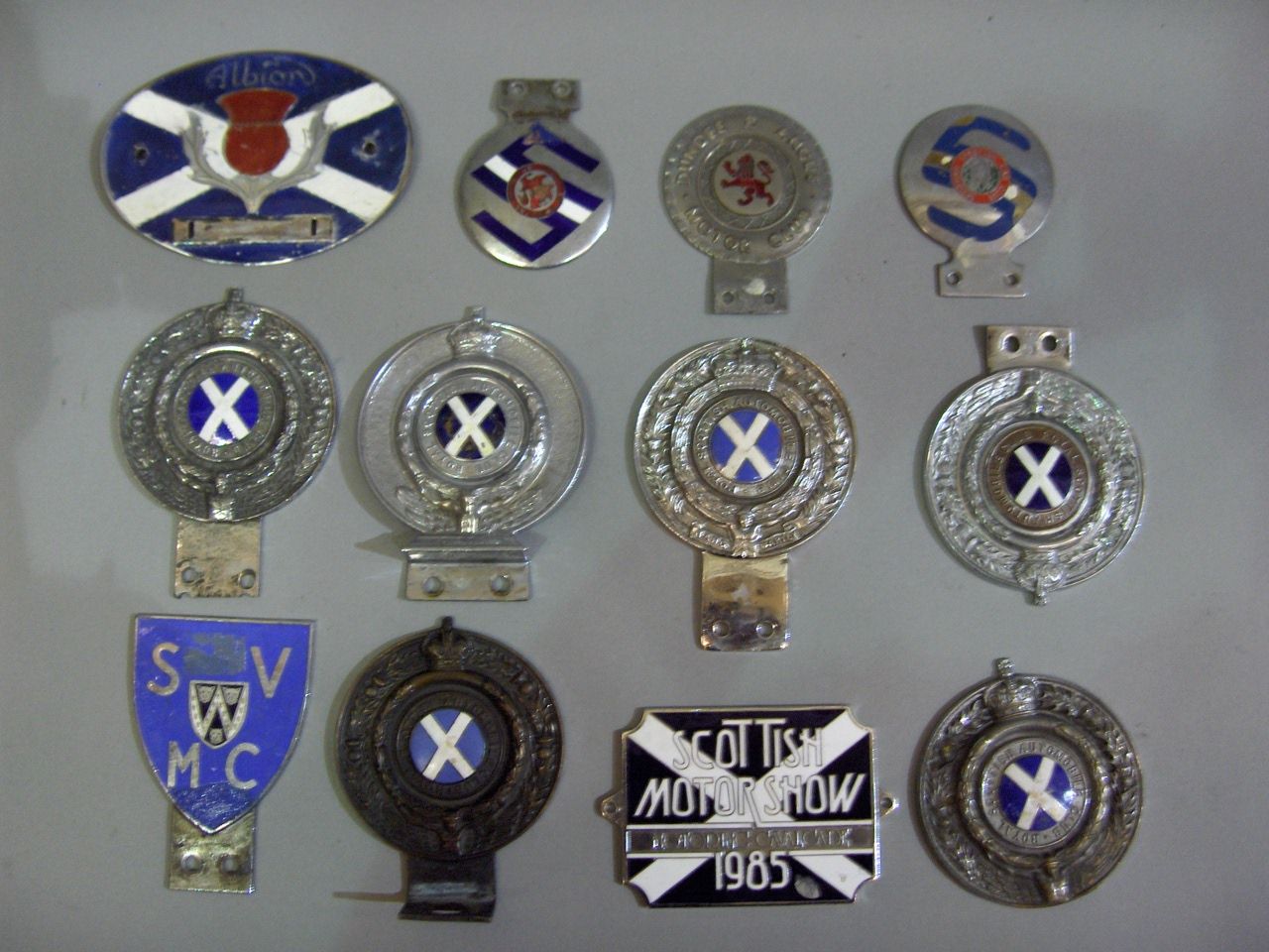 Bonhams Cars : A good lot of Scottish motoring badges,
