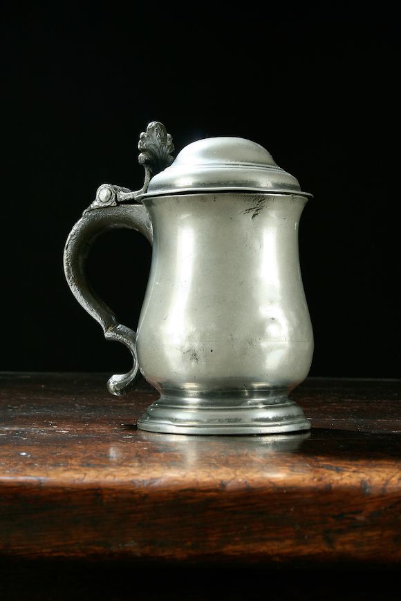 Bonhams : A pint O.E.W.S tulip shaped dome-lidded tankard