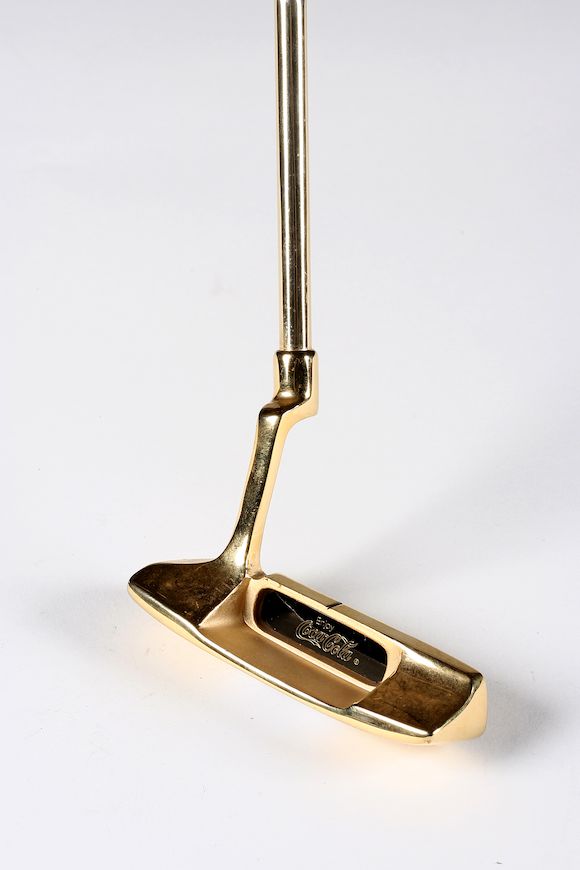 Bonhams : A 24 Kt. gold putter in the style of a Ping Anser