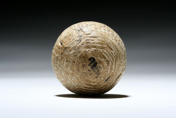 Bonhams : An un-named hand-hammered gutty golf ball circa 1860s