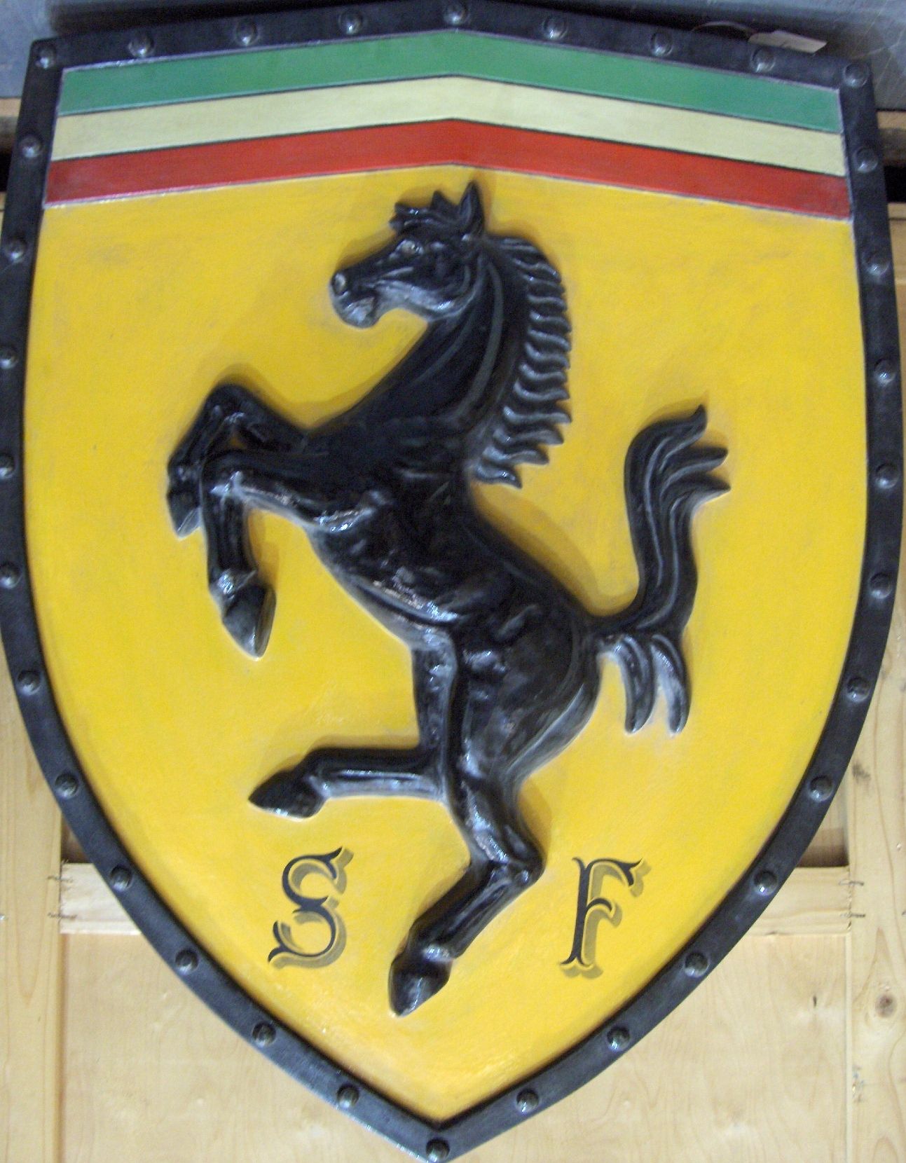 Bonhams Cars : A hand-painted fibreglass Ferrari badge,