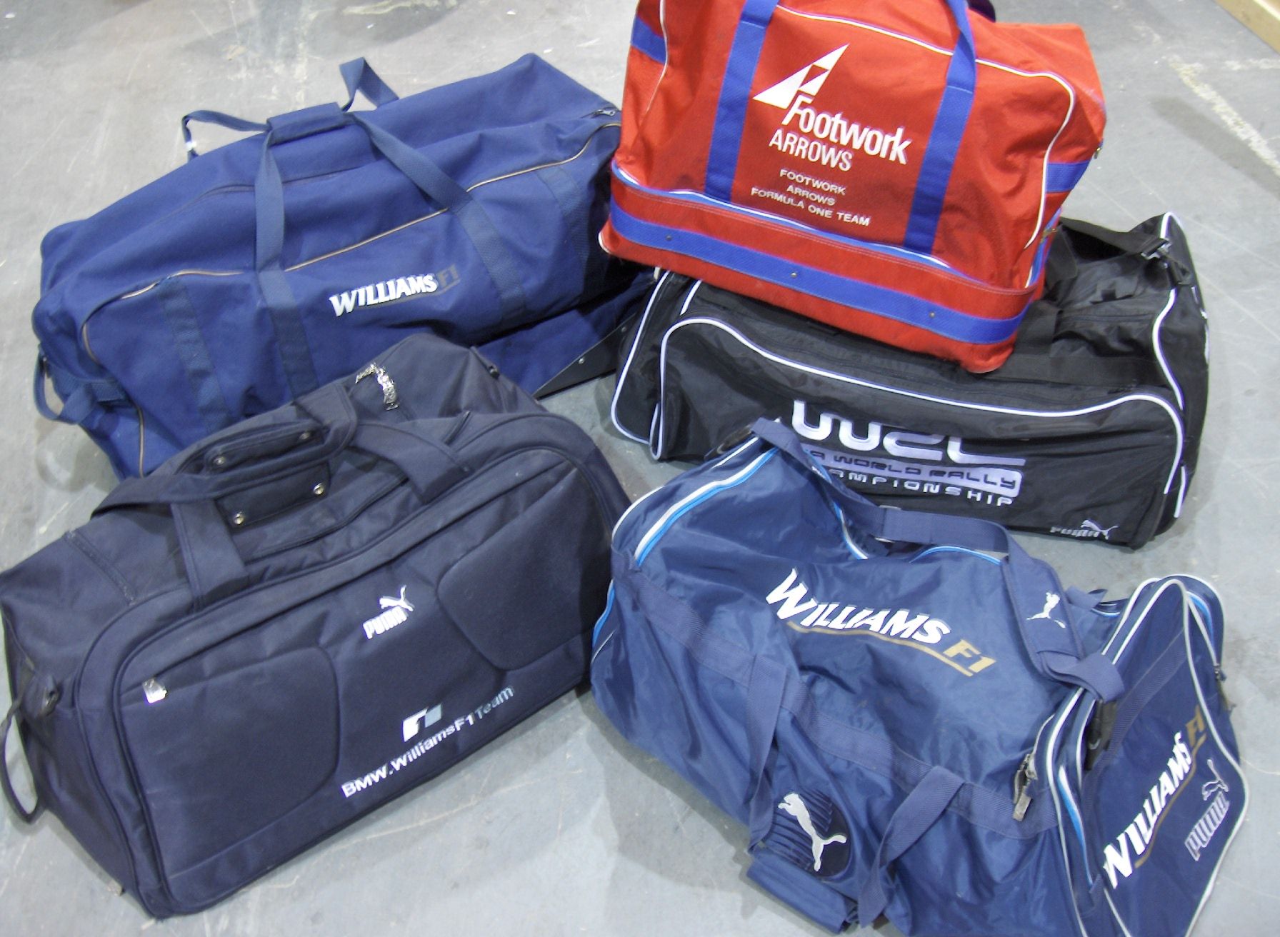 Bonhams Cars : A quantity of racing team luggage,