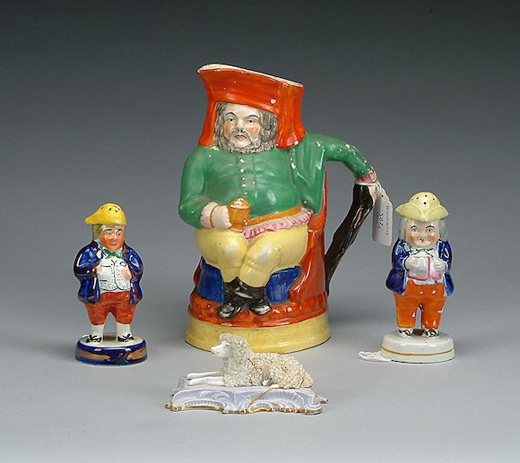 Bonhams : A 'Falstaff' Toby jug, circa 1880, a porcelain recumbent ...