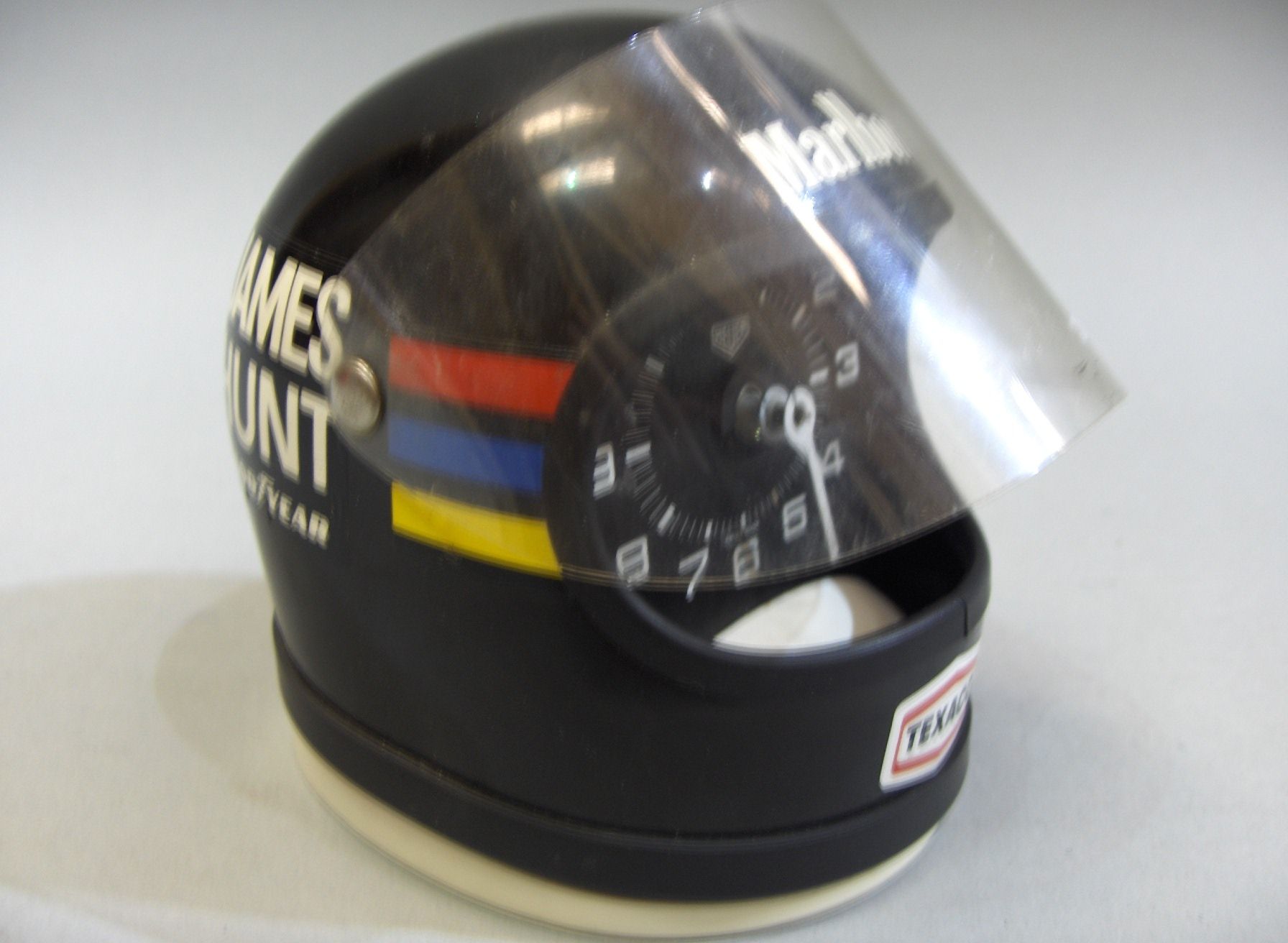 Bonhams Cars : An original Heuer helmet clock, James Hunt, 1976,