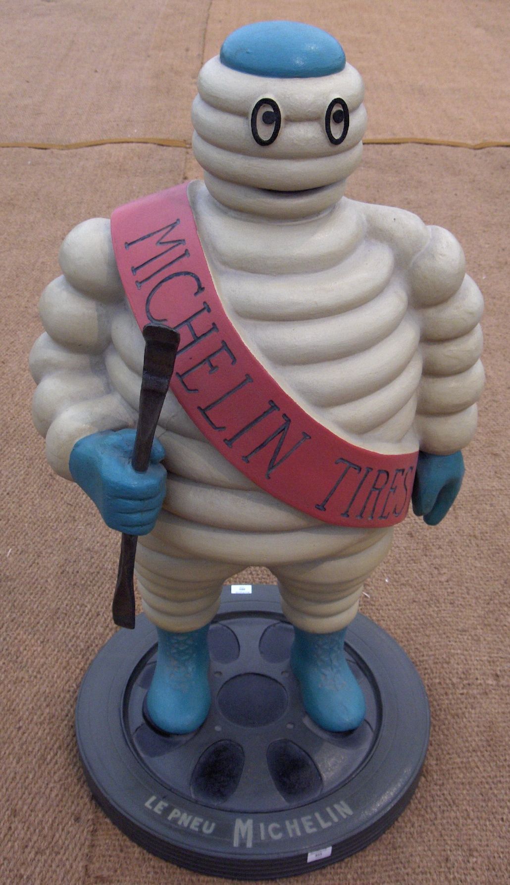 Bonhams Cars : A hand painted glass fibre Michelin man,
