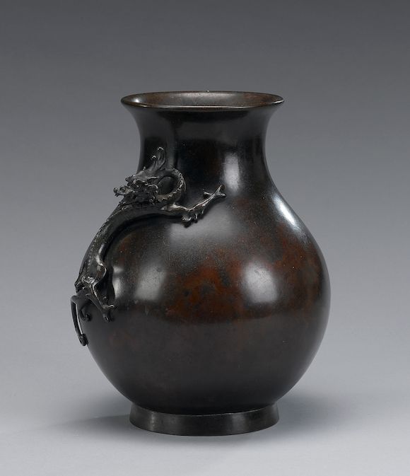 Bonhams : A shibui, patinated bronze vase decorated with a single three ...